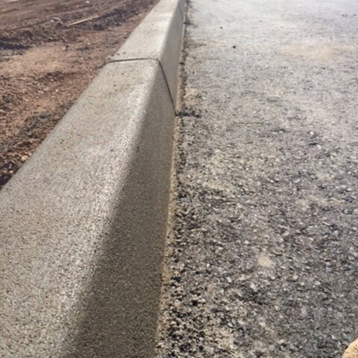 Cutting Edge Curbing Parking Lot Curb w/ Tack Oil | SiteOne US